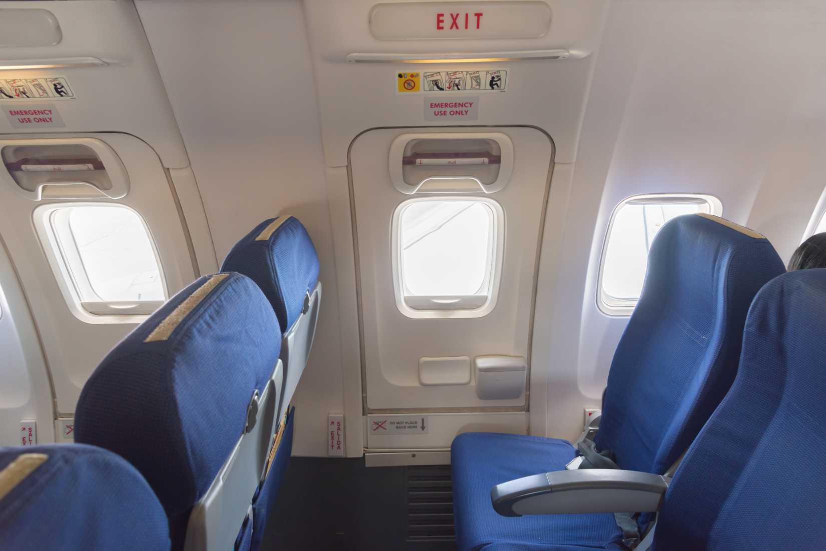 Why Do Airliner Wings Have Little Yellow Hooks?