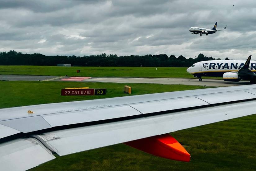 Explained: The Yellow Hooks On Airplane Wings That Could Save Your Life