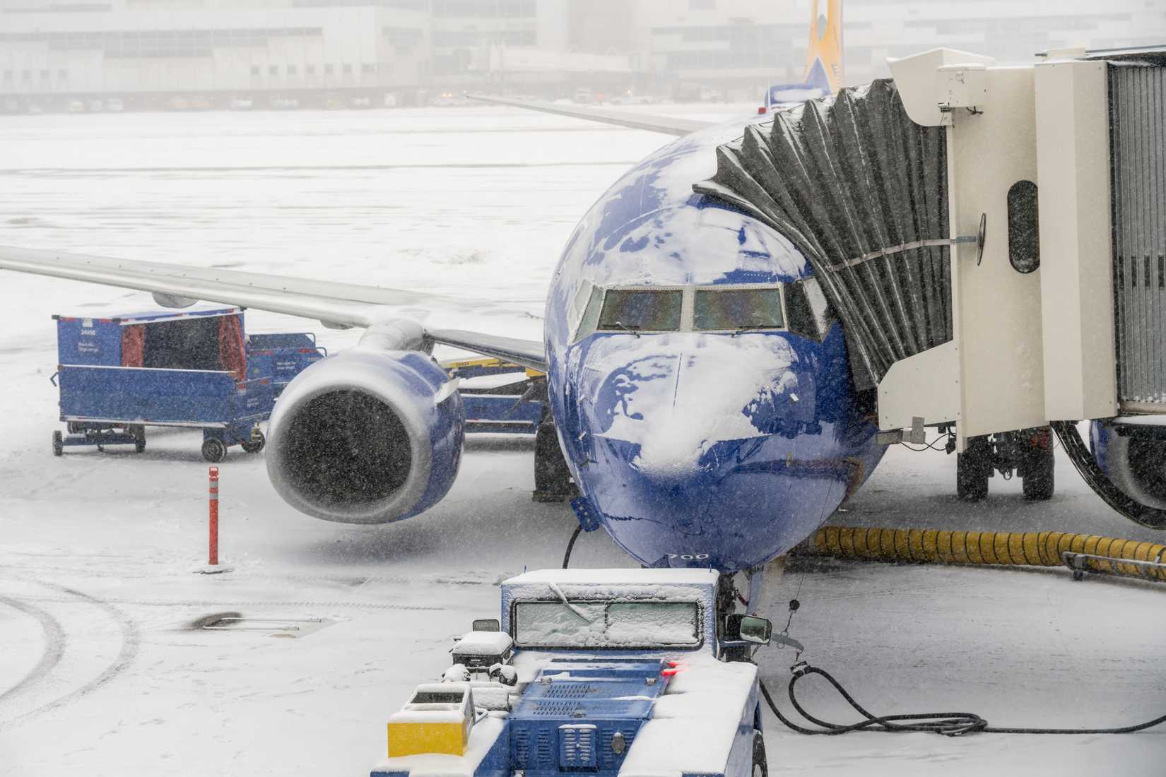 Ronald Reagan Washington National Airport Closes Runways To Clear Snow