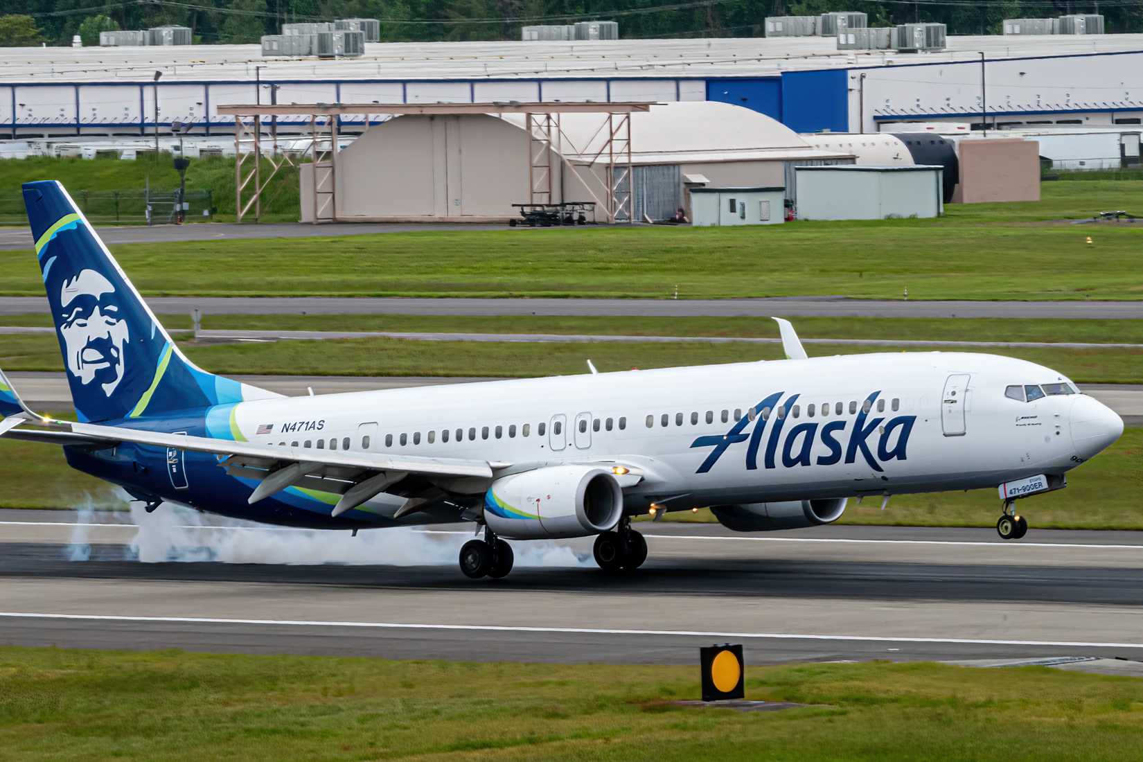 Alaska Airlines Passenger Opens Emergency Exit & Walks On Wing