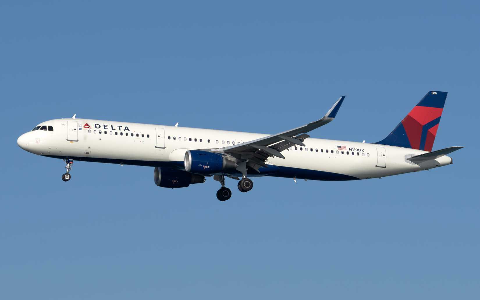 Former Delta Flight Attendant Files Lawsuit Alleging He Was Fired For ...
