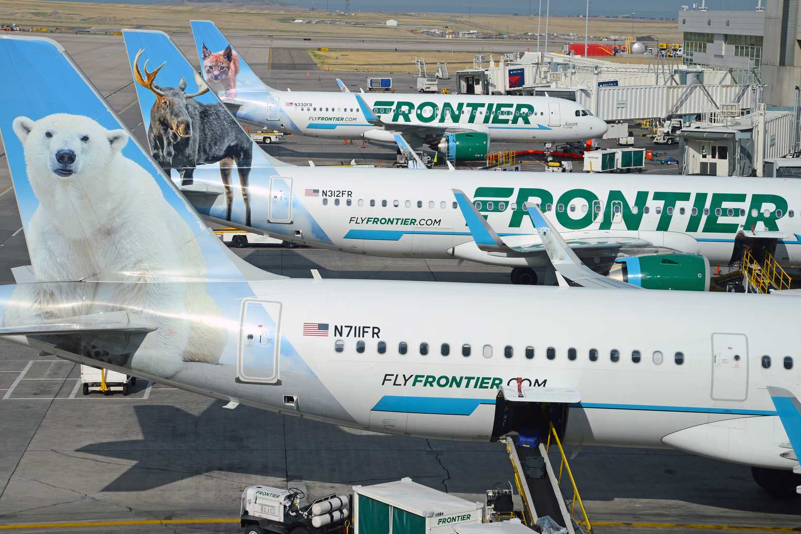 Unruly Frontier Airlines Passenger Restrained Inflight After Kicking ...