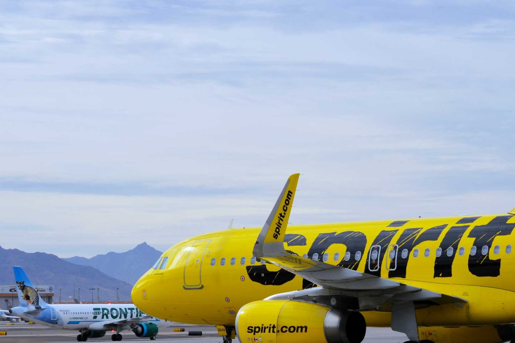 Why Spirit Airlines Really Doesn't Want To Join Forces With Frontier