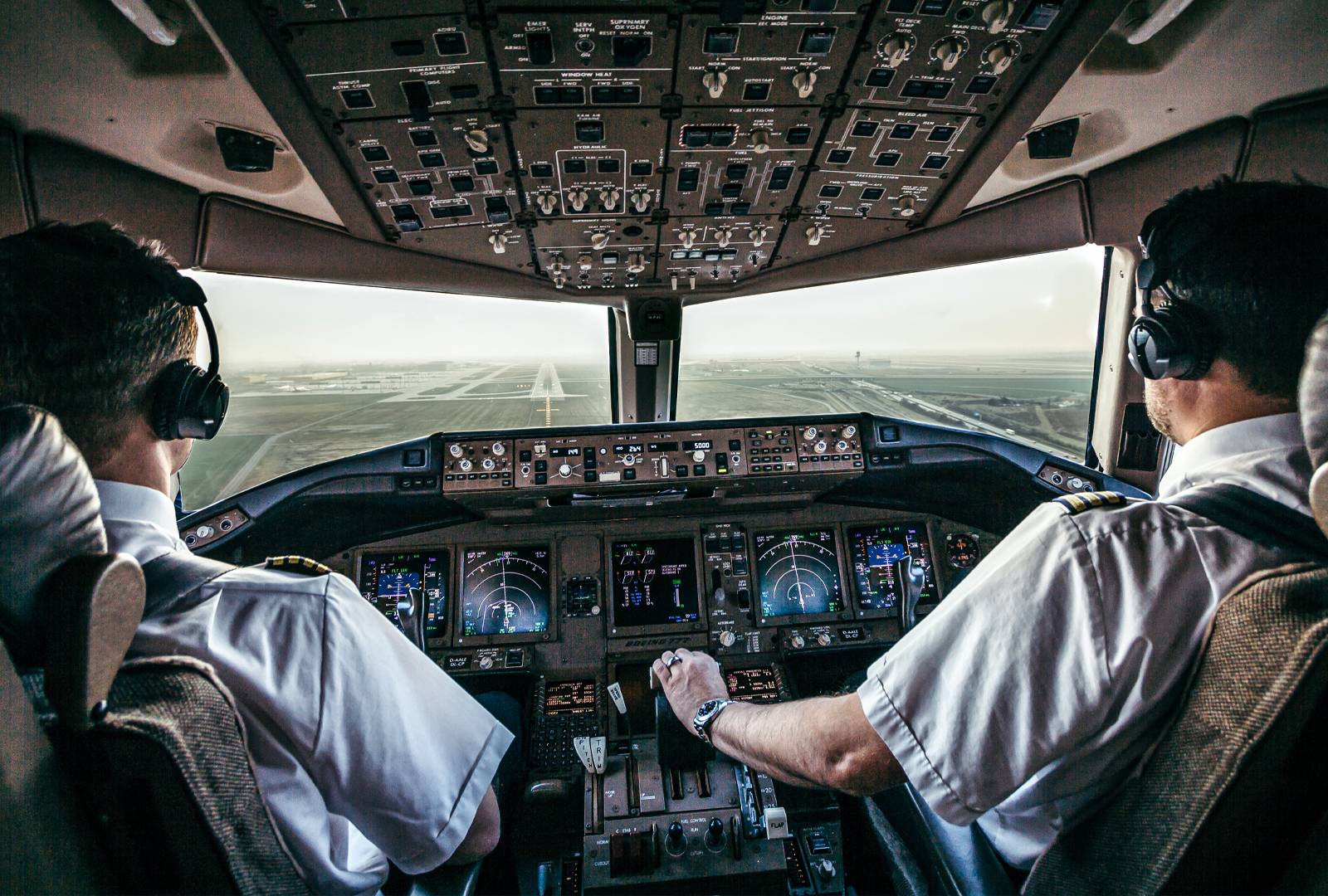 Airline Pilot In Cockpit