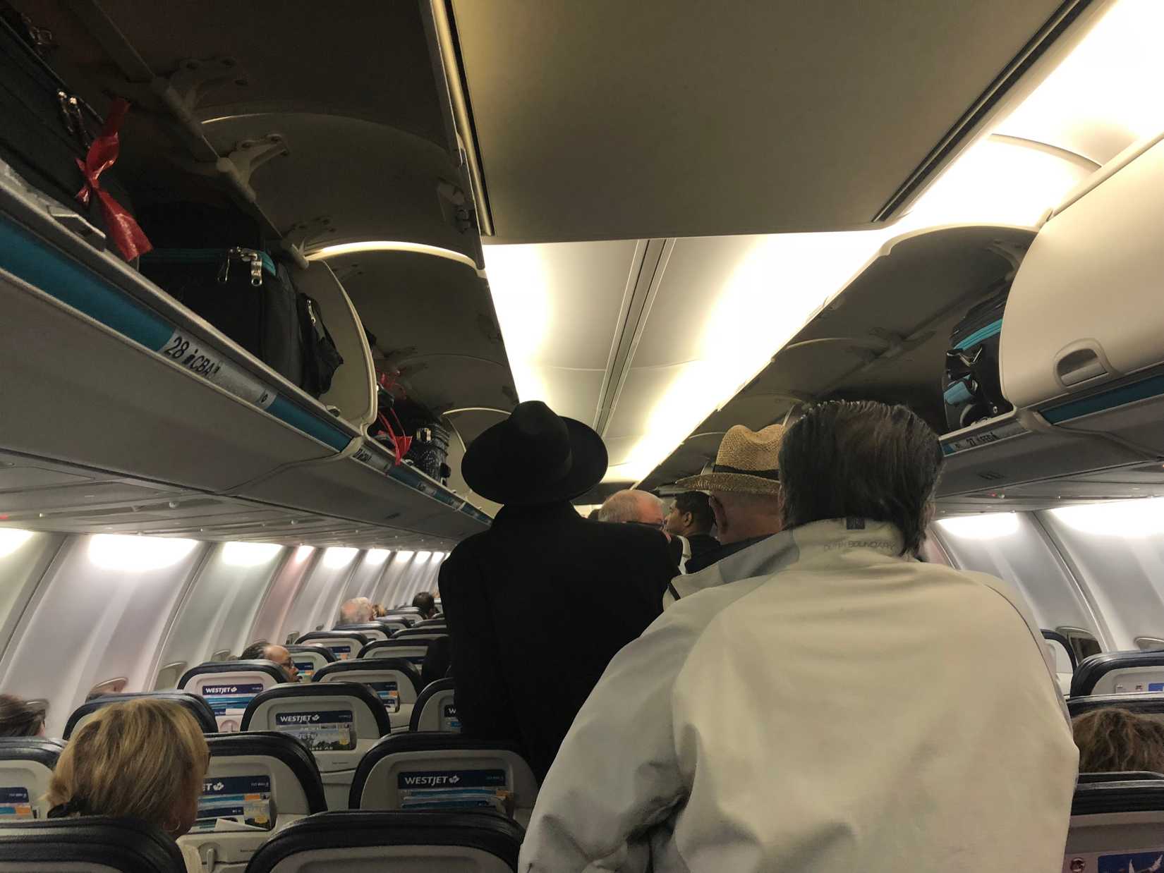 WestJet Under Fire For Cramped Legroom After Family Video Goes Viral