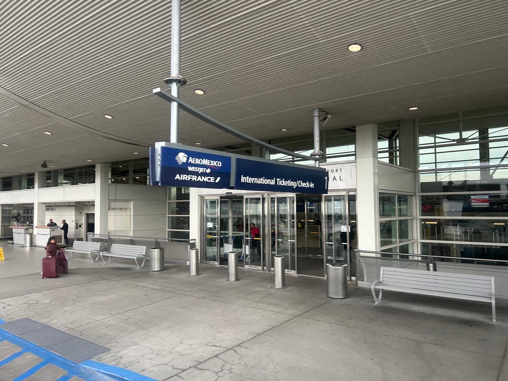 Watch: Car Crashes Into Delta Check-In Area At Detroit Metro Airport